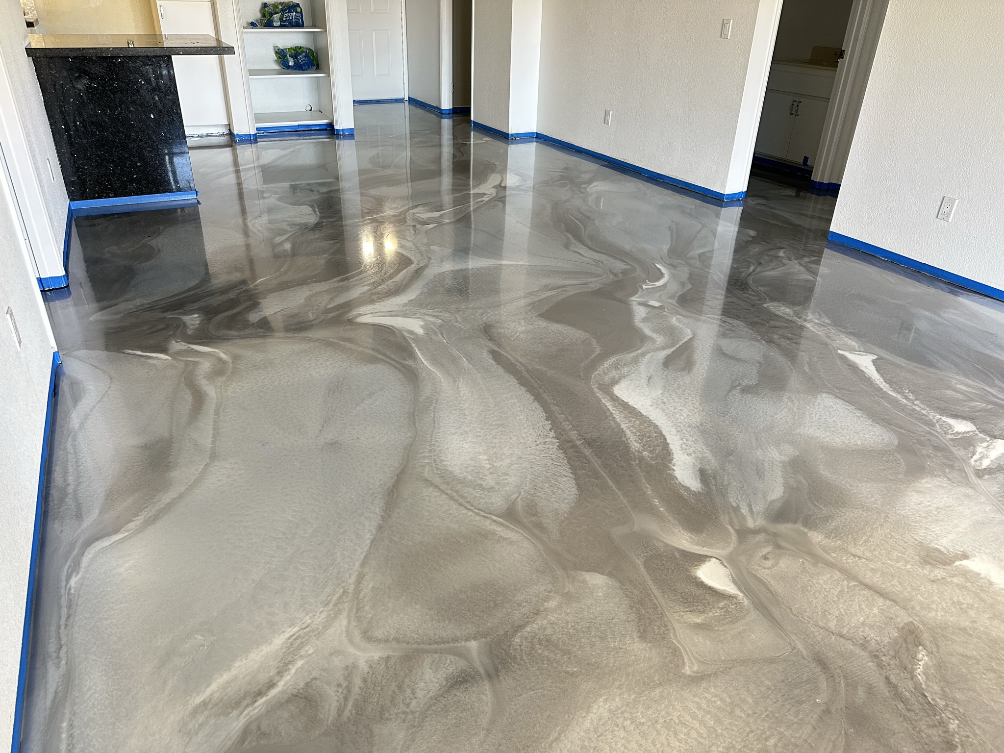 Flake vs. Metallic Epoxy Floors: Key Differences Explained | Artisan Design Concepts